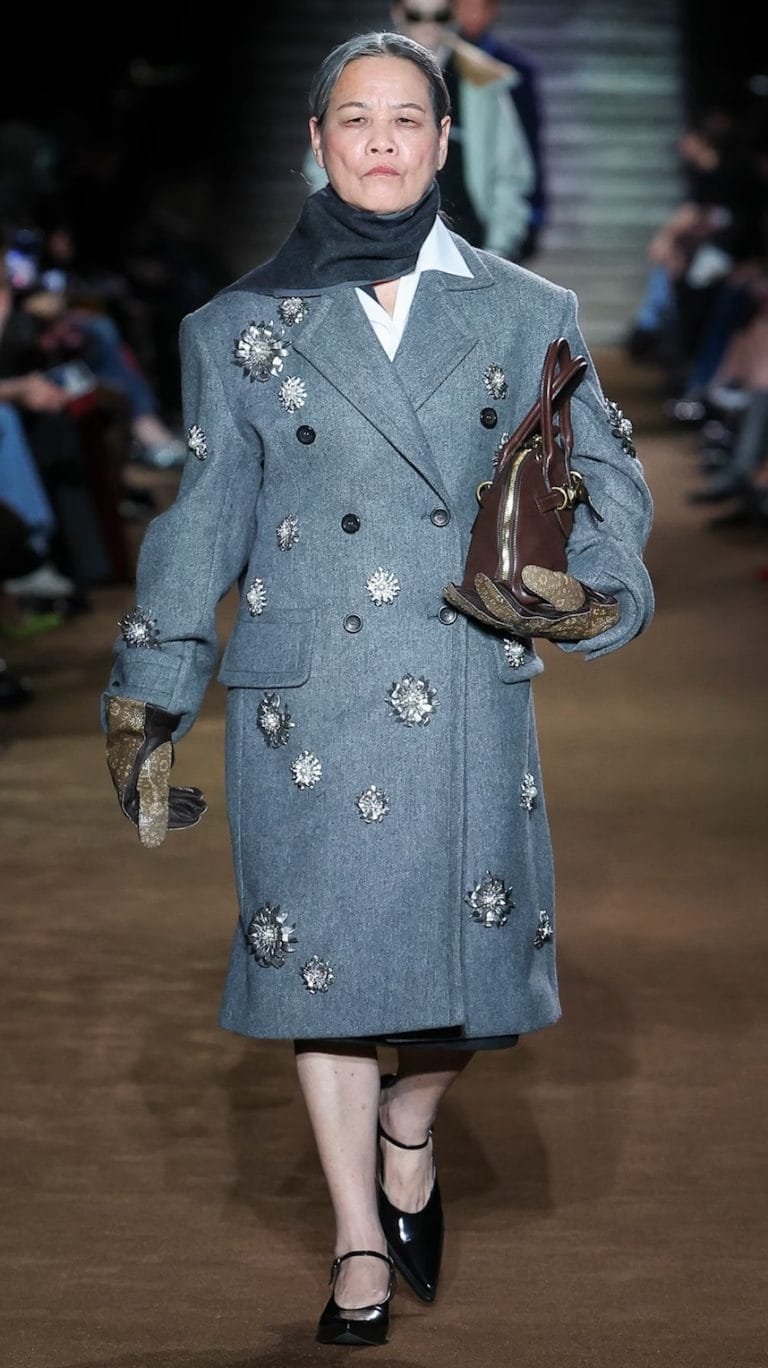 70 Year Old Model Qin Huilan Walks For Miu Miu Fall/Winter 2024